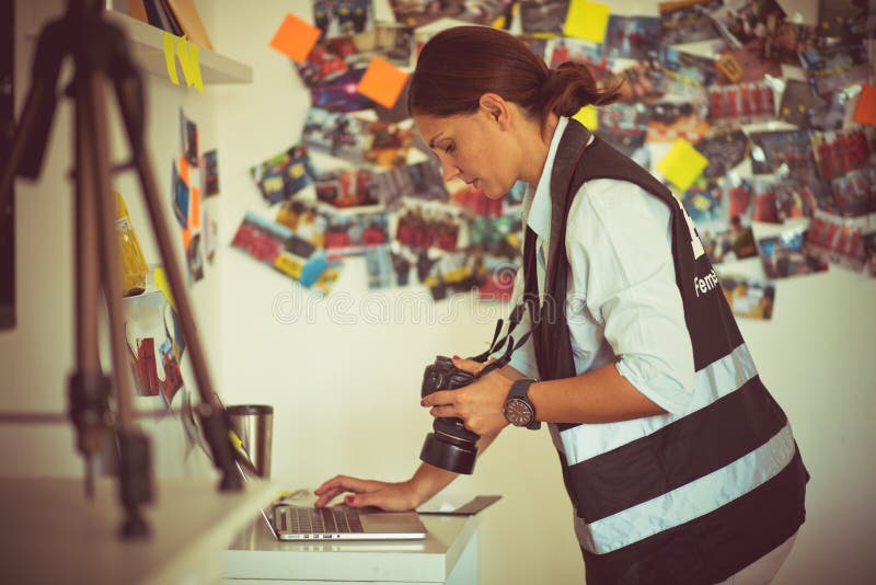 Agent with Camera. FBI Woman Works on a Case Stock Photo - Image of ...