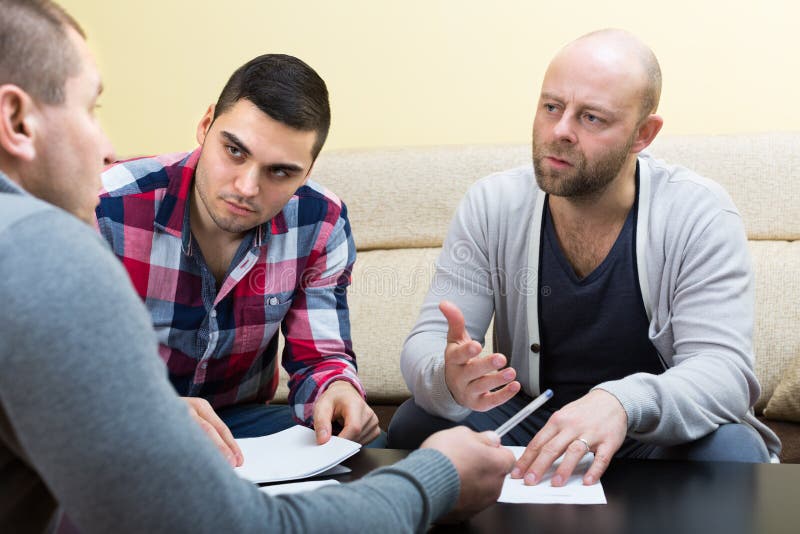 Agent Explaining Adults How To Overcome Crisis Stock Photo - Image of ...