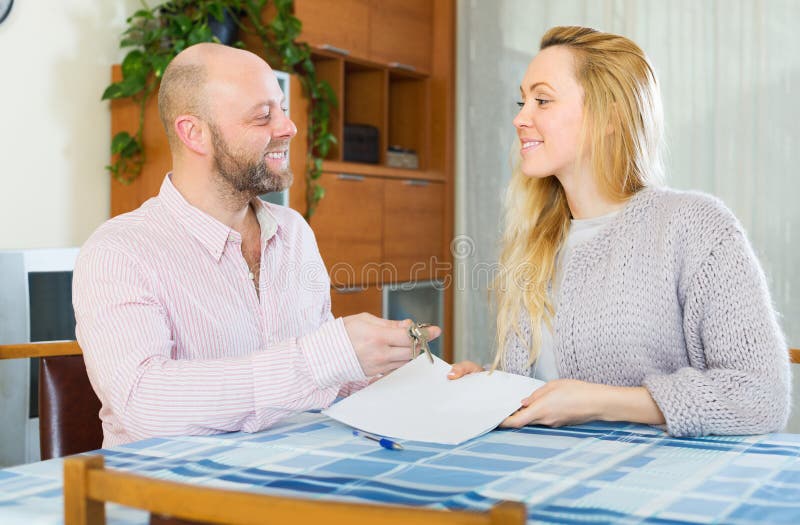 Agent Giving To Female Keys Stock Image - Image of contract, flat: 76651855