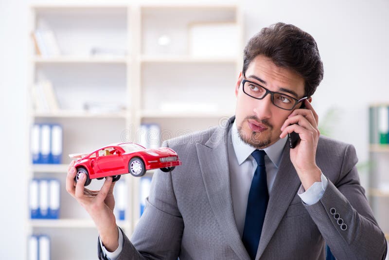 The Agent Offering Car Motor Insurance Stock Photo - Image of agent ...