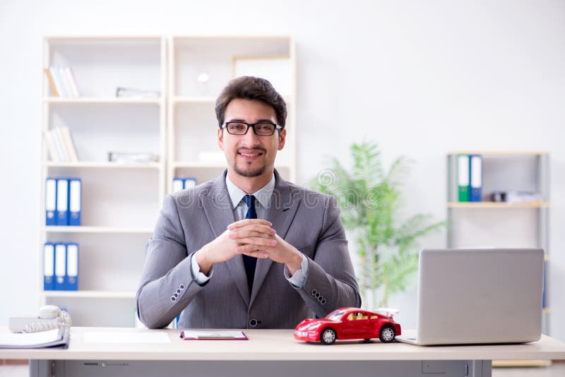 The Agent Offering Car Motor Insurance Stock Photo - Image of agent ...