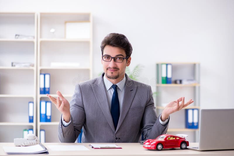 The Agent Offering Car Motor Insurance Stock Photo - Image of indemnity ...