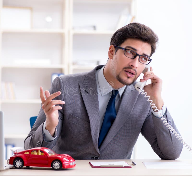 The Agent Offering Car Motor Insurance Stock Photo - Image of agent ...