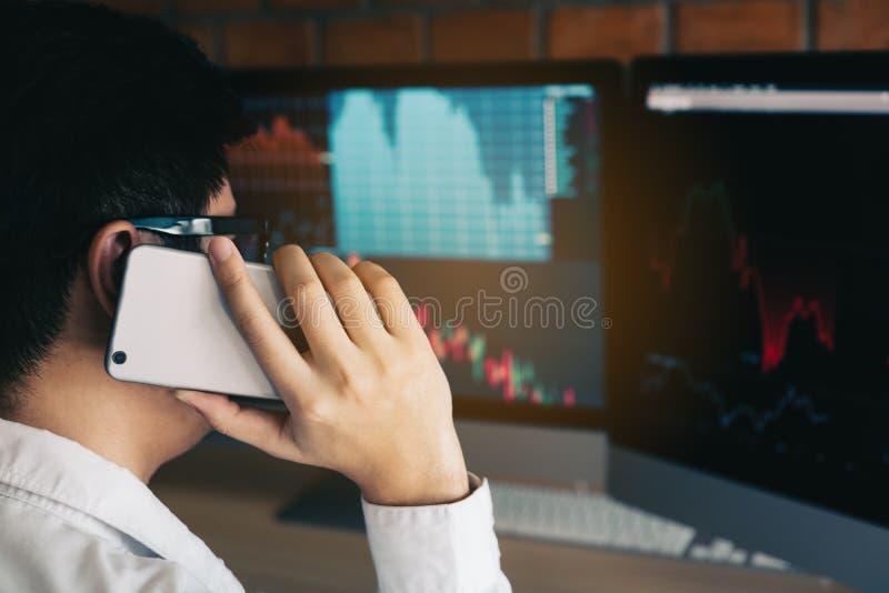 Agent Trader Man Talking at Telephone and Checking Business Stock Data ...