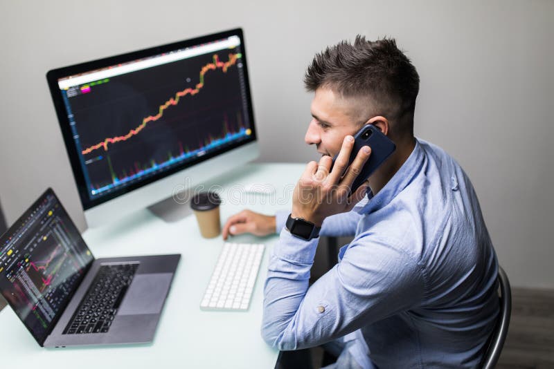 Agent Trader Man Talking at Telephone and Checking Business Stock Data ...