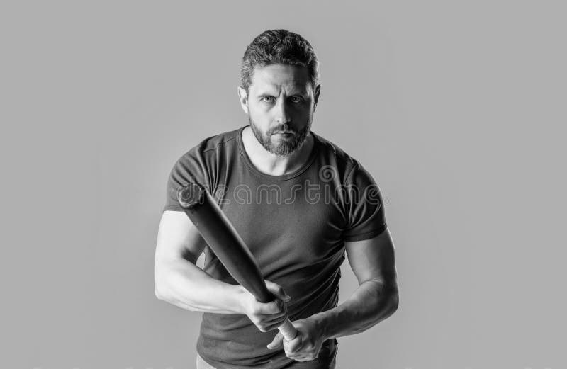 Aggression of Adult Man with Bat in Studio. Photo of Man with ...