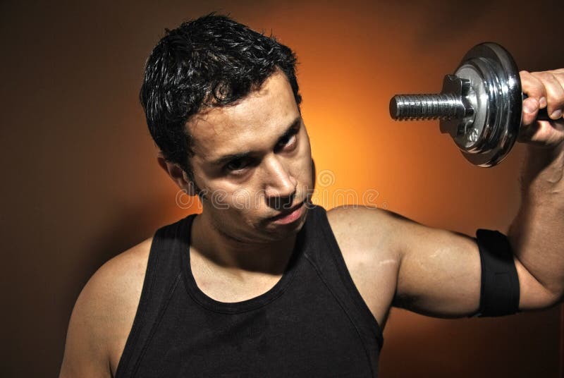 Aggressive Athlete Training with Dumbbells Stock Photo - Image of ...