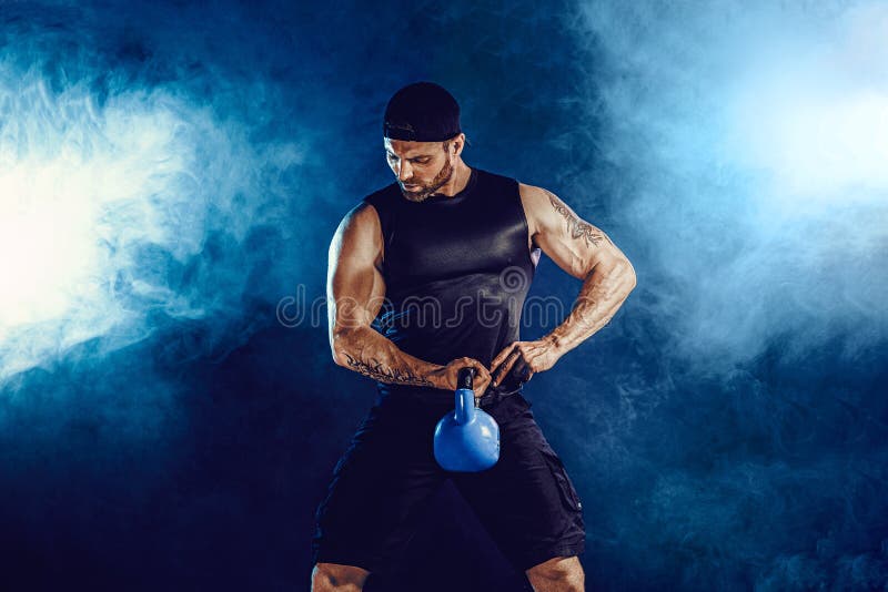 Aggressive Bearded Muscular Bodybuilder Doing Exercise for the Biceps ...
