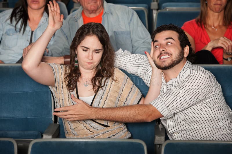 Aggressive date in Theater stock image. Image of audience - 23577137
