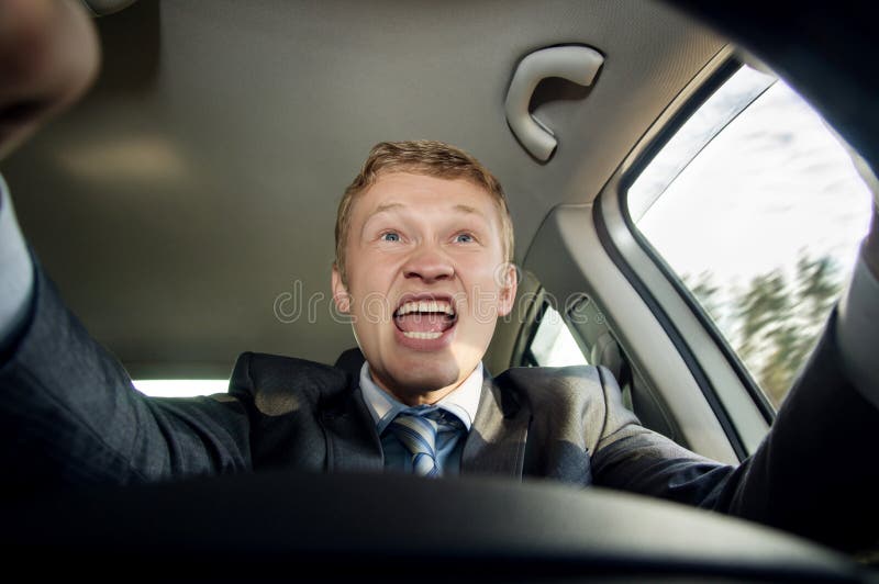 Aggressive Driver Behind the Wheel of a Car Stock Photo - Image of beep ...