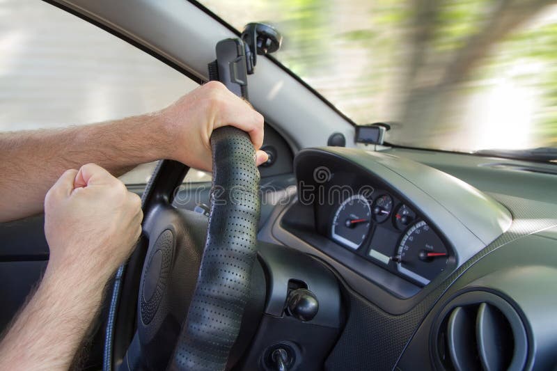 An Aggressive Driver Driving a Car Exceeds the Speed Limit. Stock Image ...