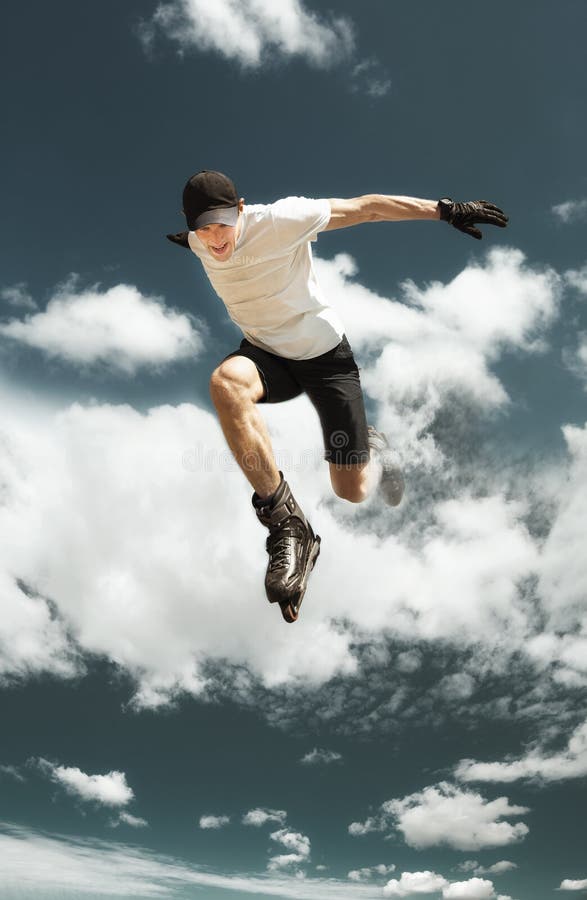 Aggressive Riding. a Young Athlete Performs a Roller Skate Jump. Stock ...