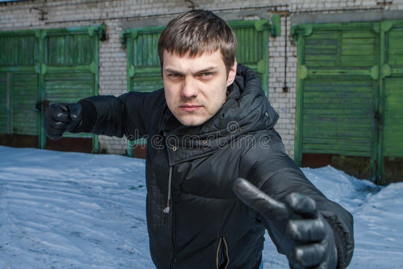 Angry Man Punching in a Street Fight. Stock Image - Image of fight ...