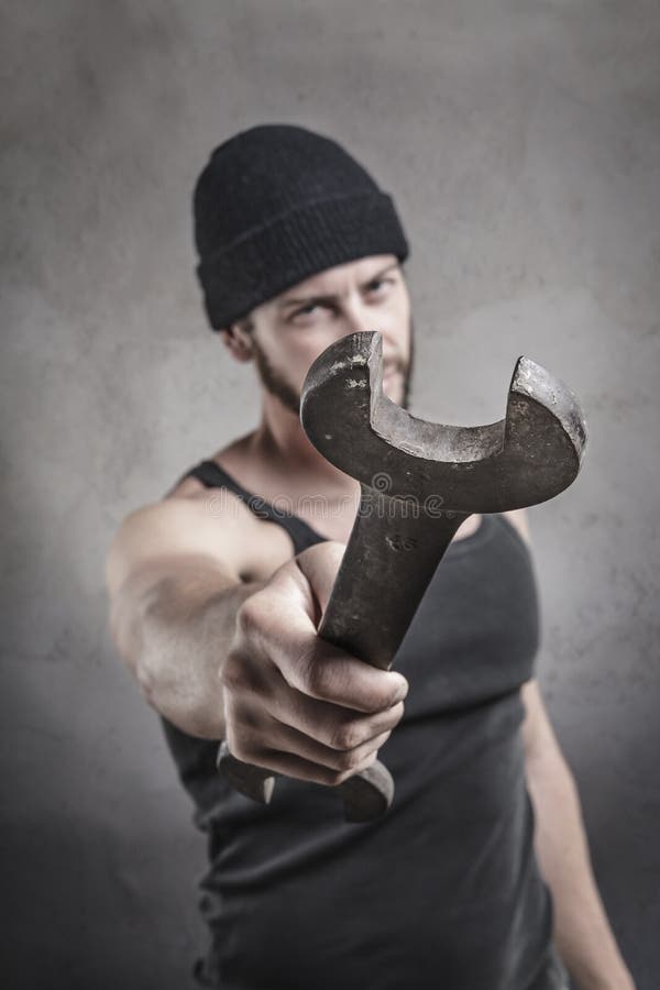 Aggressive Man Using a Wrench As a Weapon Stock Photo - Image of male ...