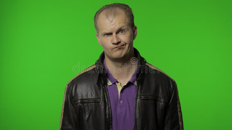 Aggressive Rocker Man in Brown Leather Jacket Looking with Crazy ...