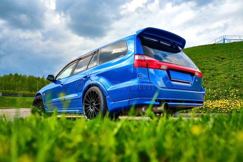 Aggressive Sport Car in Blue Against the Background of Nature Stock ...