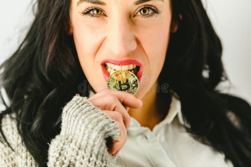 Aggressive Woman Biting a Golden Bitcoin Coin Isolated on White Stock ... Aggressive Woman Biting a Golden Bitcoin Coin Isolated on White Stock ...