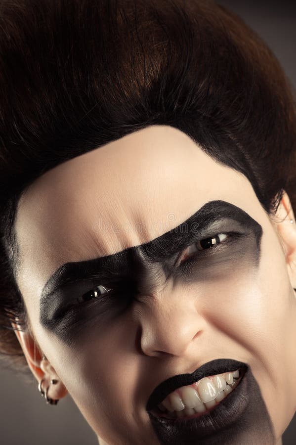 Aggressive Woman Face with Creative Dark Makeup Stock Image - Image of ...