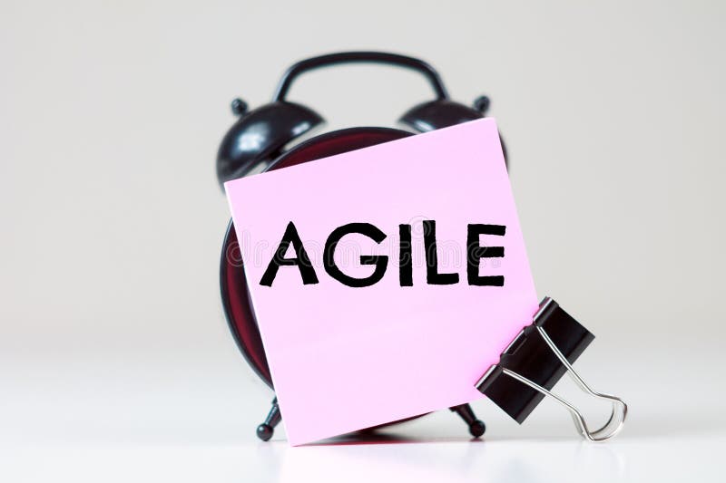 Agile Text on a Sticker for Reminders with an Alarm Clock Stock Photo ...