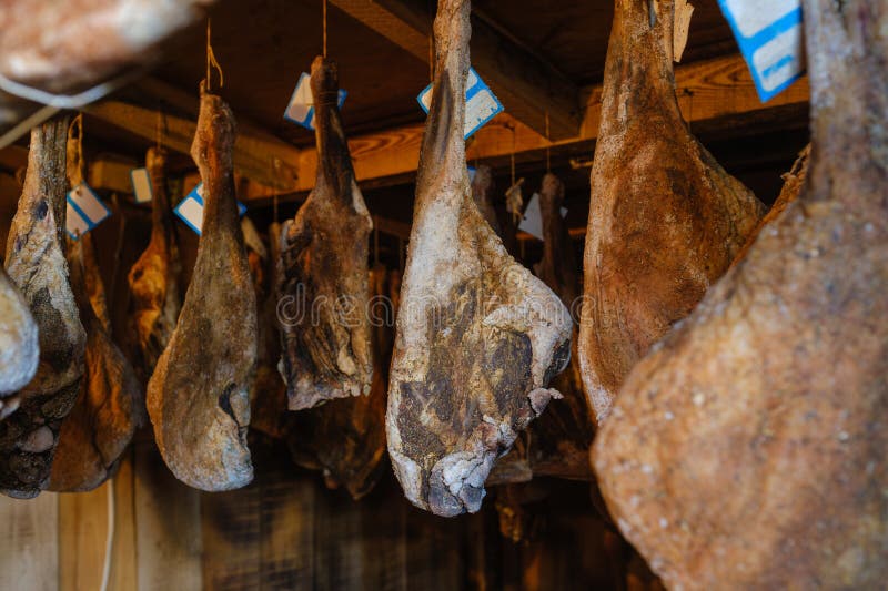 Aging Hams Hanging in Traditional Curing Room Stock Image - Image of ...
