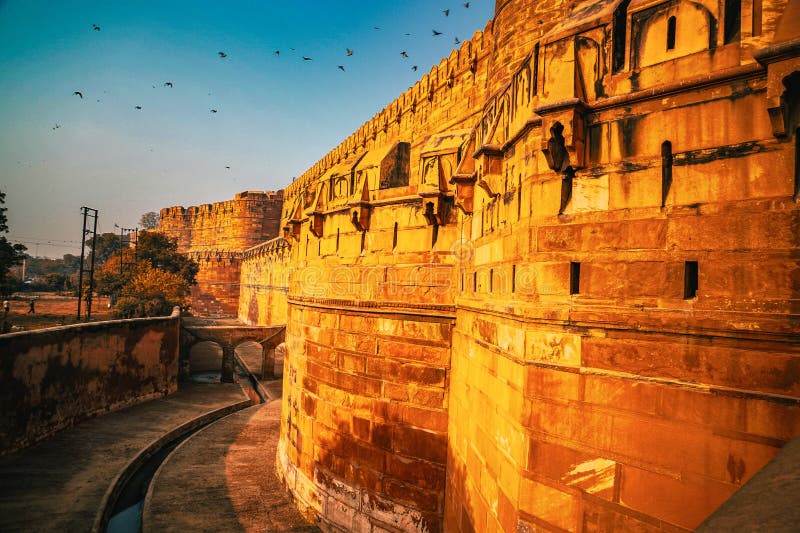 Agra Fort Red Sandstone Wall Stock Photo - Image of tourists, blue ...