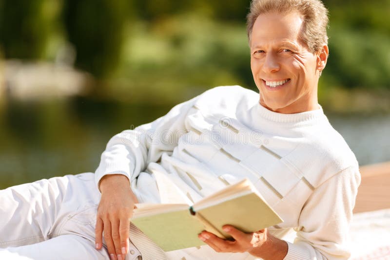 Agreeable Man Reading a Book Stock Image - Image of portrait, activity ...