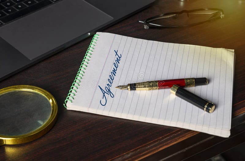 Agreement Document with Fountain Pen and Laptop Office Table Stock ...