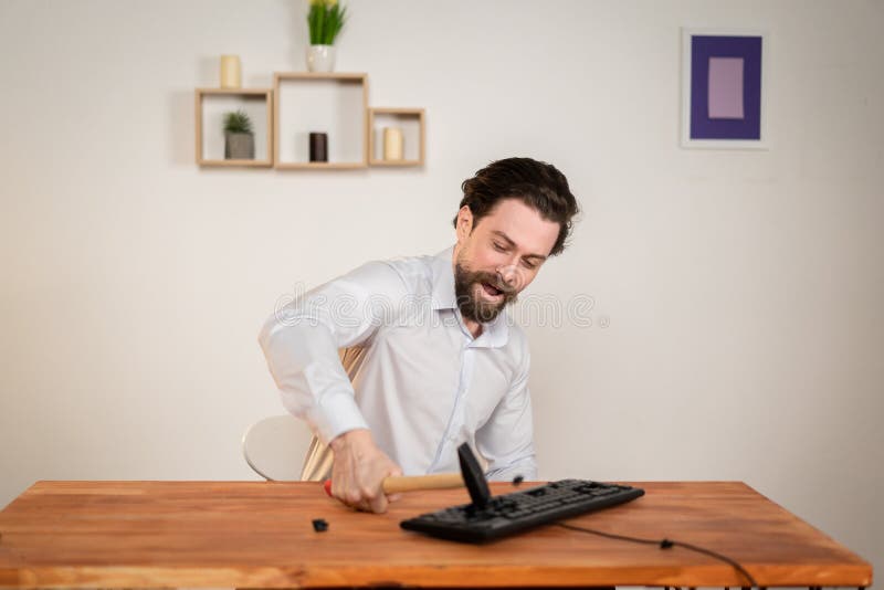 Angry Man Destroy His Computer Stock Photos - Free & Royalty-Free Stock ...