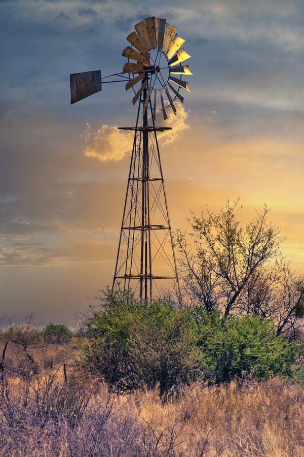 A Windmill Water Pump on a Farm in South Africa Mixed Media Stock Photo ...