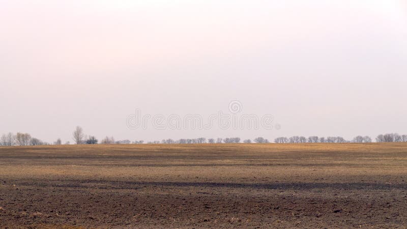 Agricultural Field on a Cloudy Spring Evening Stock Photo - Image of ...