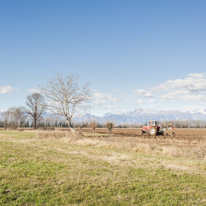 Agricultural Landscape with Tractor Plowing. Stock Image - Image of ...