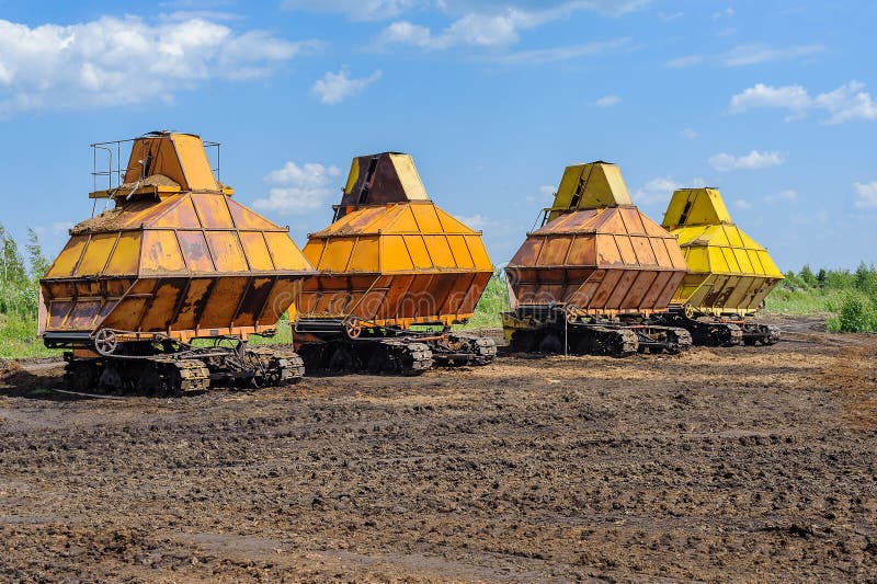 Peat extraction process stock photo. Image of landscape - 128557212