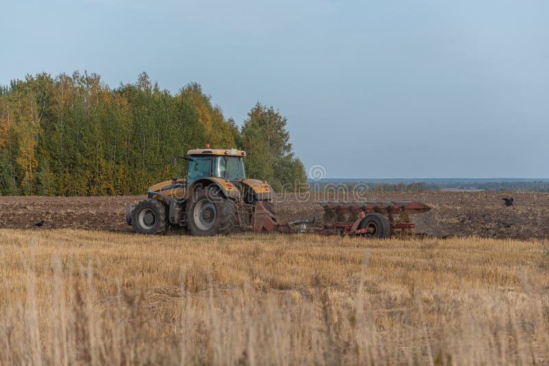 Agricultural Machines at Work in the Field Stock Photo - Image of ...