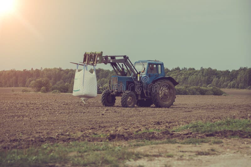 Agricultural Machines at Work in the Field Stock Photo - Image of ...