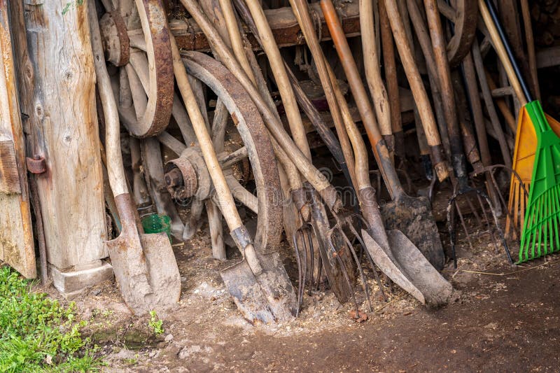 Agricultural Tools. Old Spades, Rakes and Wheel Wheels Stock Image ...