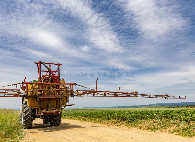 Agricultural Tractor Moving on the Agricultural Road Stock Image ...