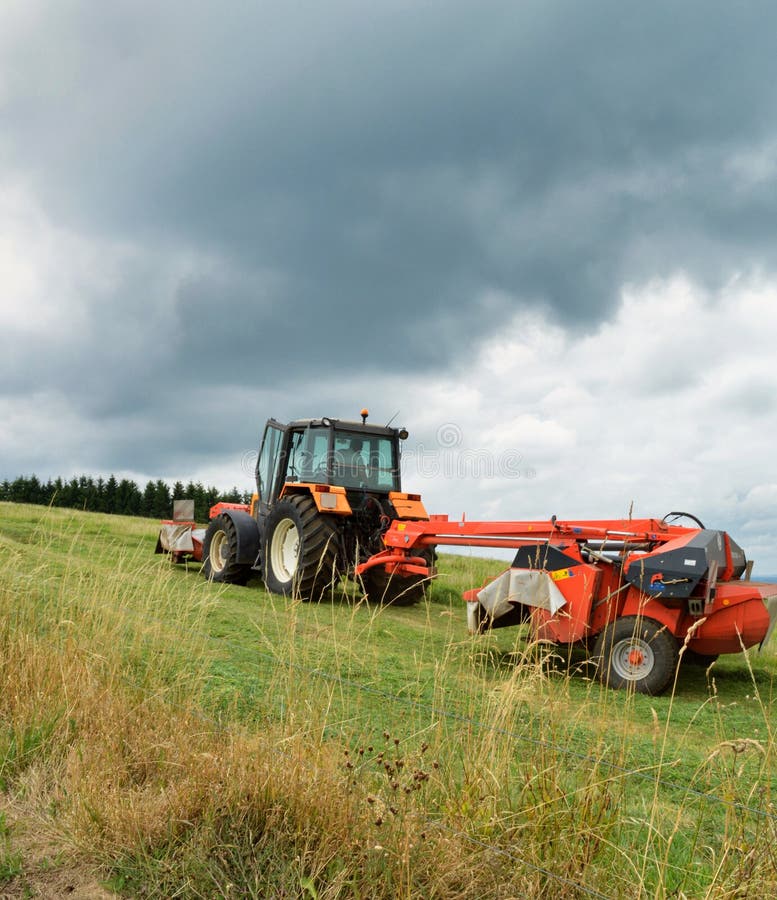 An Agricultural Tractor with a Mower Editorial Photography - Image of ...
