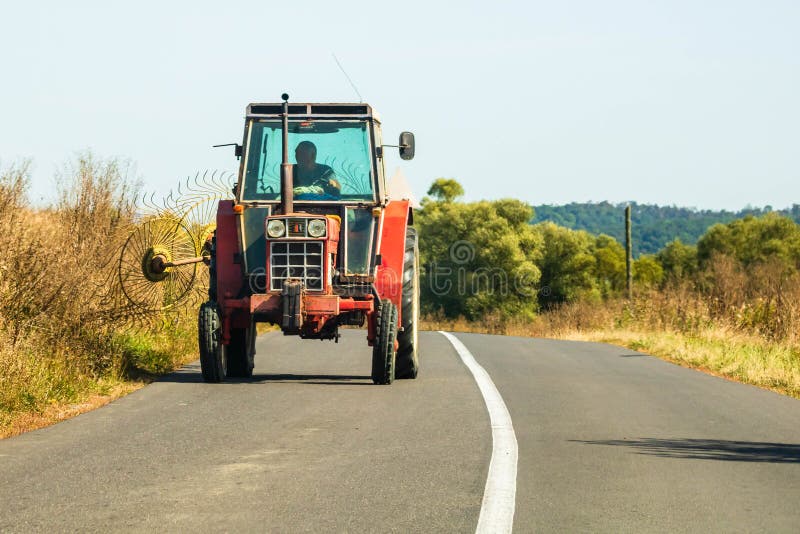 Agricultural Tractor on Road in Viscri, Romania, 2021 Editorial Photo ...