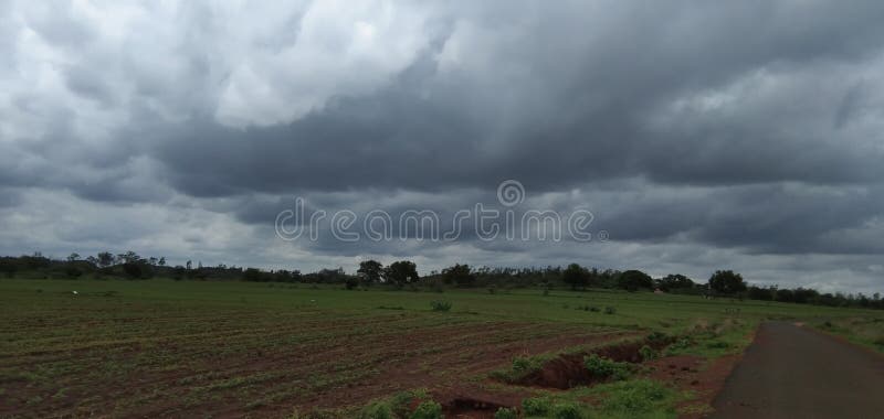 Agriculture Farm Land Rain Black Could and Road Stock Photo - Image of ...