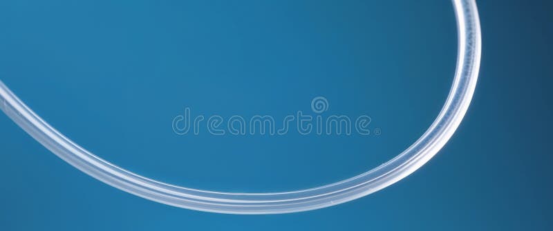Clear Flexible Plastic Wire on Blue Background for Creative Projects ...