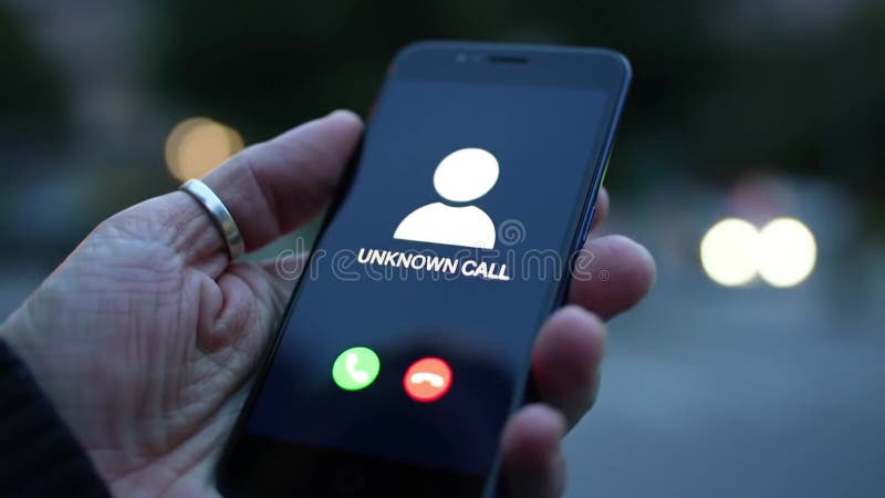Hand Holding Smartphone Displaying Unknown Call Alert Notification with ...