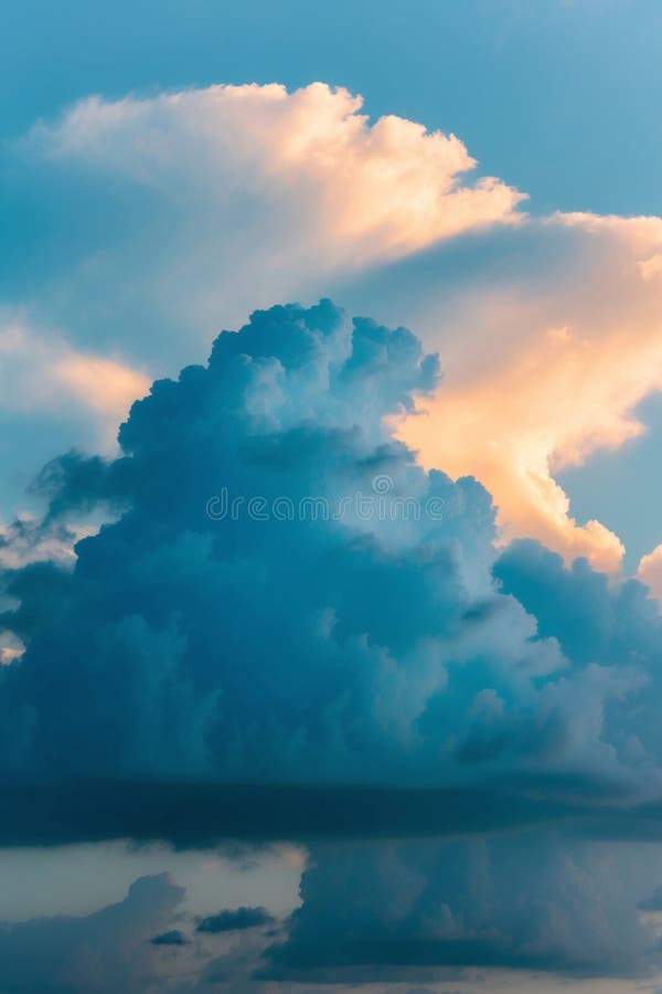 Dramatic Blue Clouds Illuminated by Sunlight during Early Evening Sky ...
