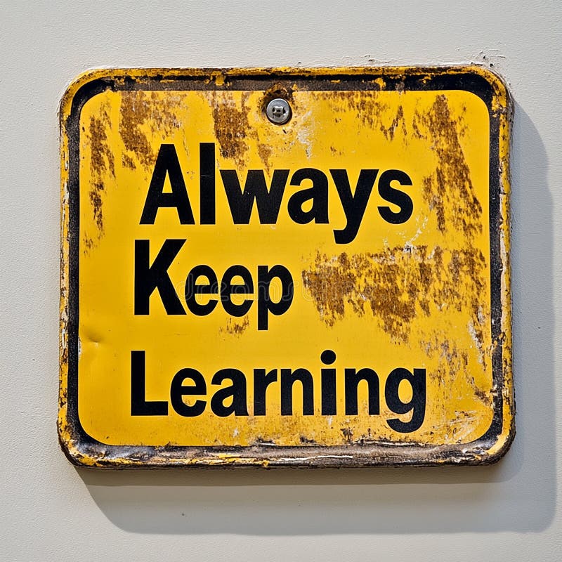 Yellow Warning Sign with "always Keep Learning" on a Neutral Backdrop ...
