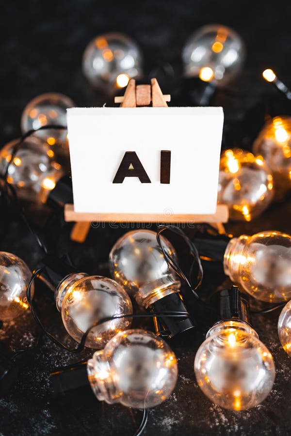 AI Text on Canvas on Easel with Light Bulbs Around it, Art and Machine ...