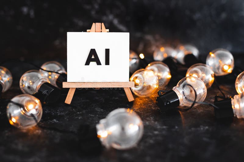 AI Text on Canvas on Easel with Light Bulbs Around it, Art and Machine ...