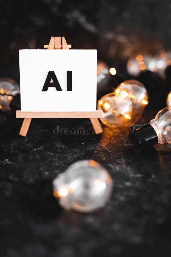 AI Text on Canvas on Easel with Light Bulbs Around it, Art and Machine ...