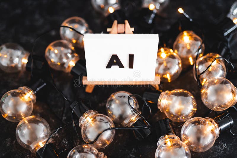 AI Text on Canvas on Easel with Light Bulbs Around it, Art and Machine ...