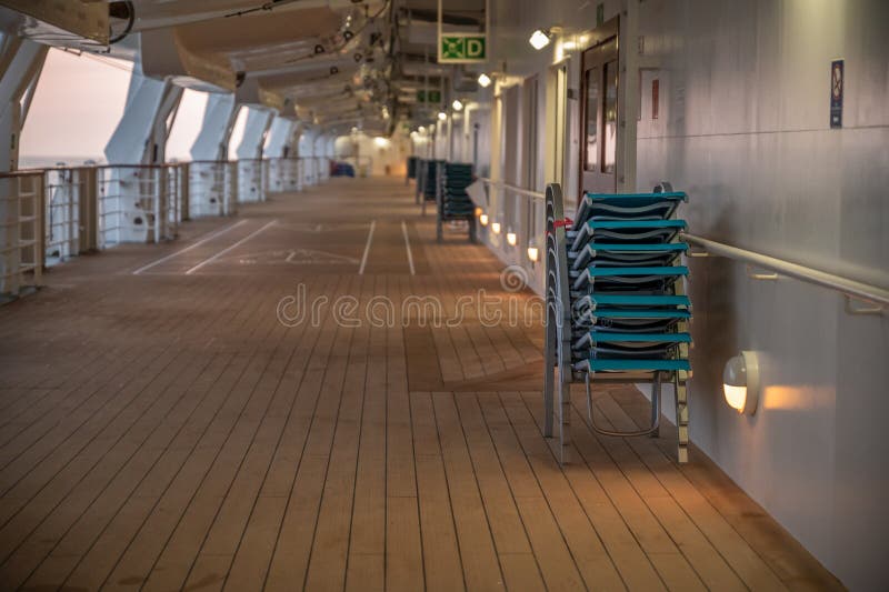 AIDA Bella Cruise Ship Side Boat Deck with Stacked Deck Chairs in the ...