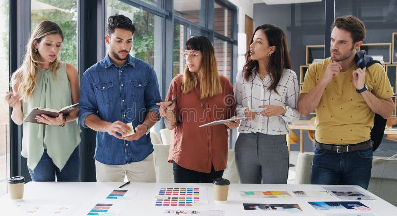 They always Aim High As a Team. a Group of Designers Brainstorming ...