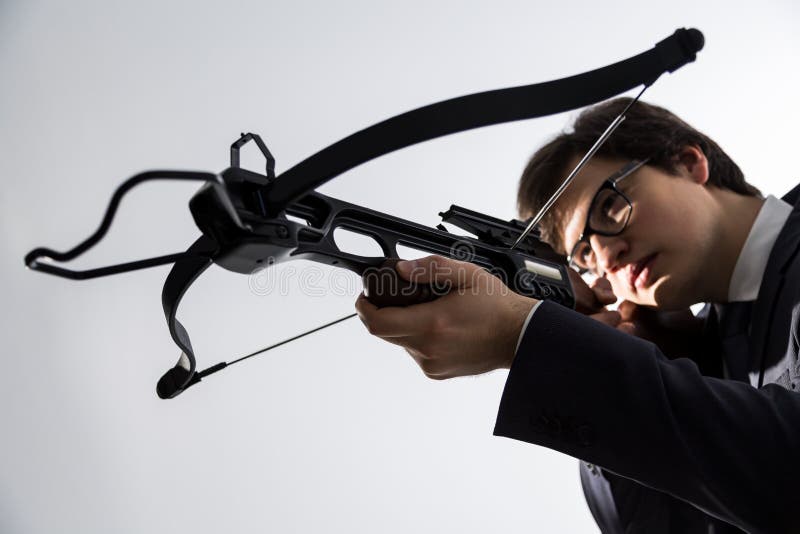 Man Aiming Crossbow At Targets Stock Image - Image of field, male: 27946097